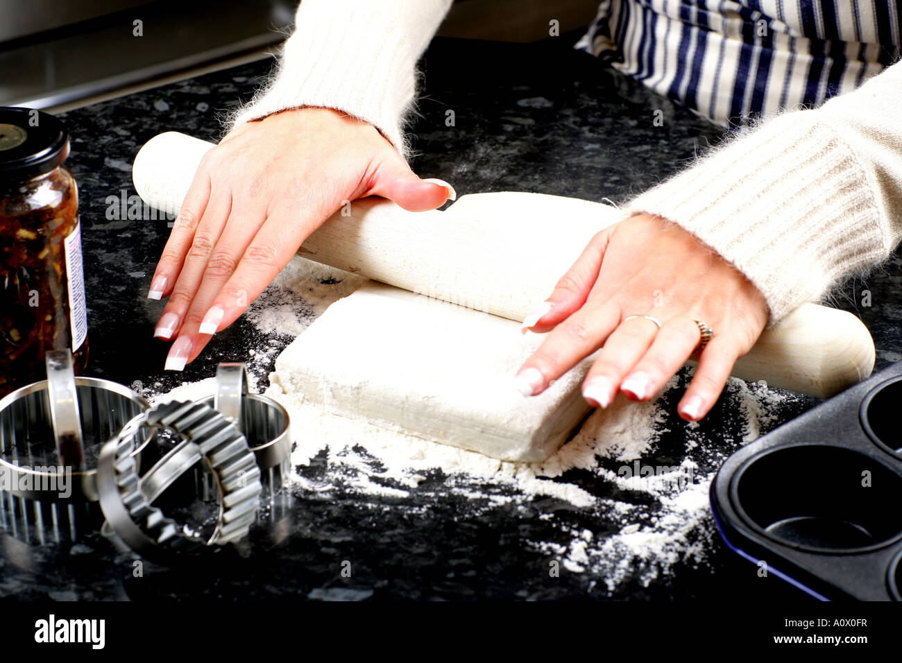Young Woman Rolling Pastry Model Released Stock Photo - Alamy