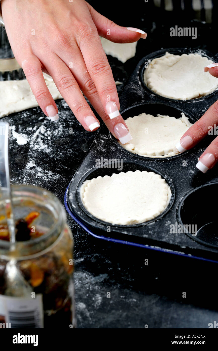 Young Woman Making Mince Pies Model Released Stock Photo - Alamy