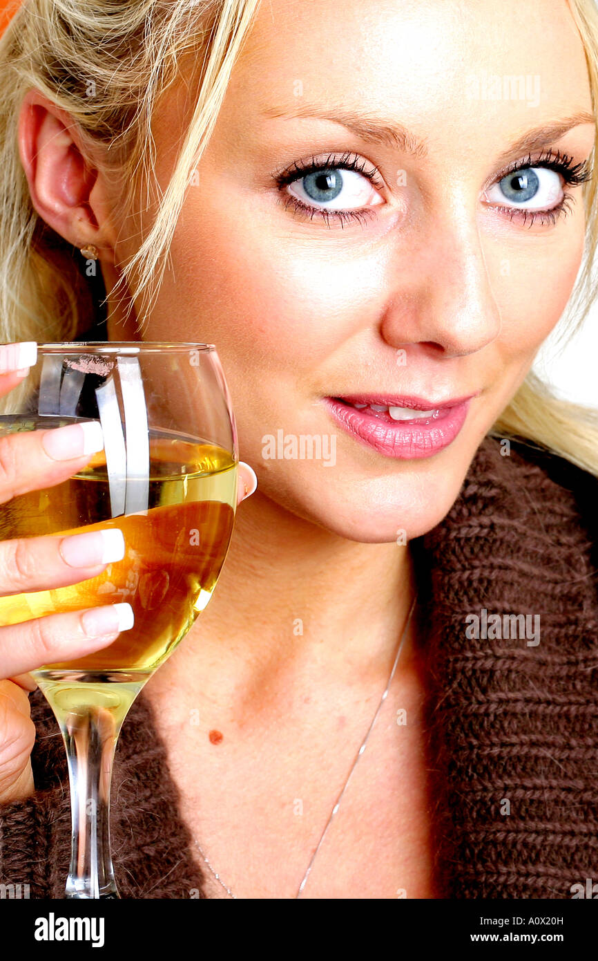 Young Woman Drinking White Wine Model Released Stock Photo - Alamy