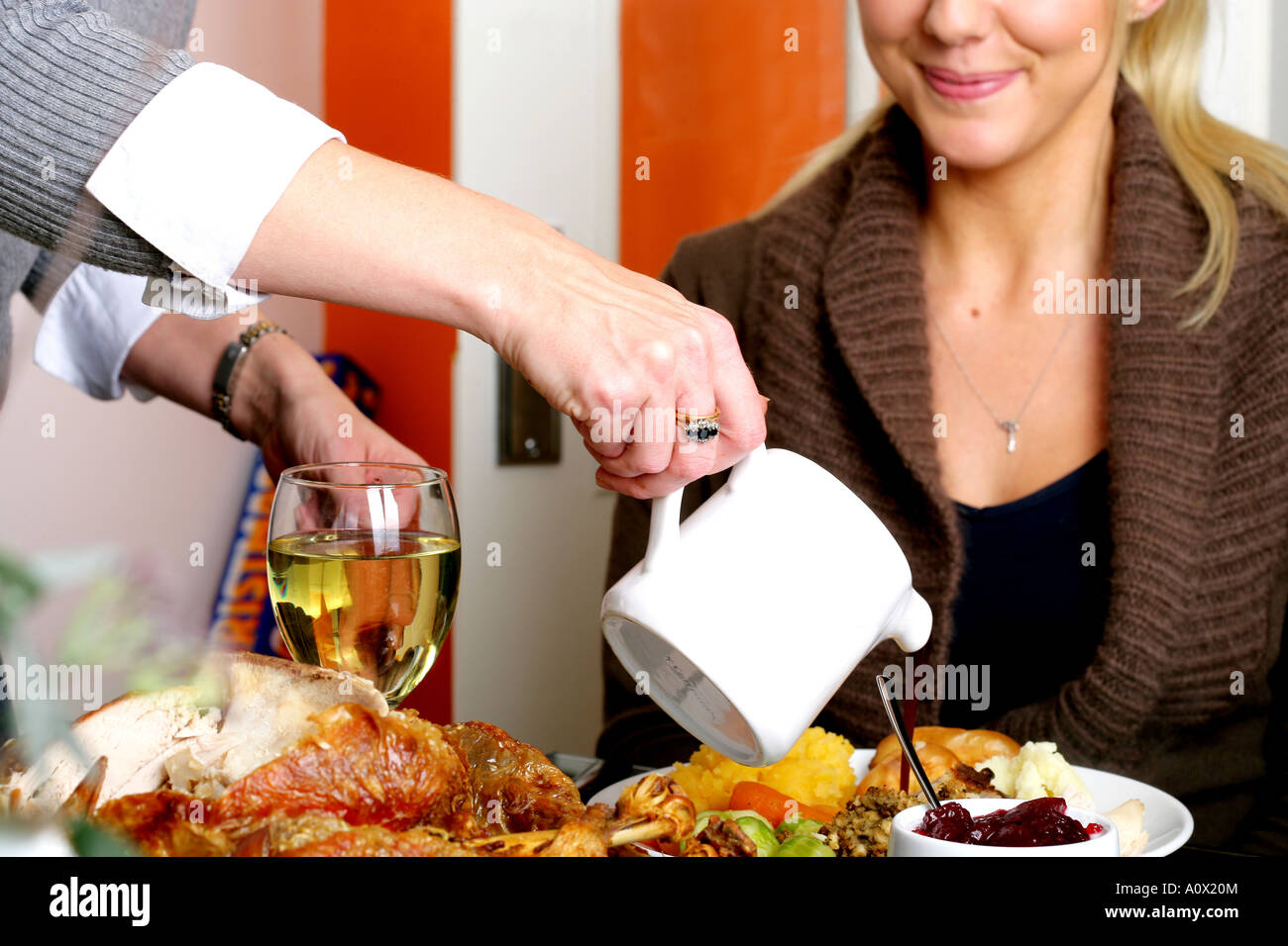 Young Women Having Christmas Dinner Model Released Stock Photo - Alamy