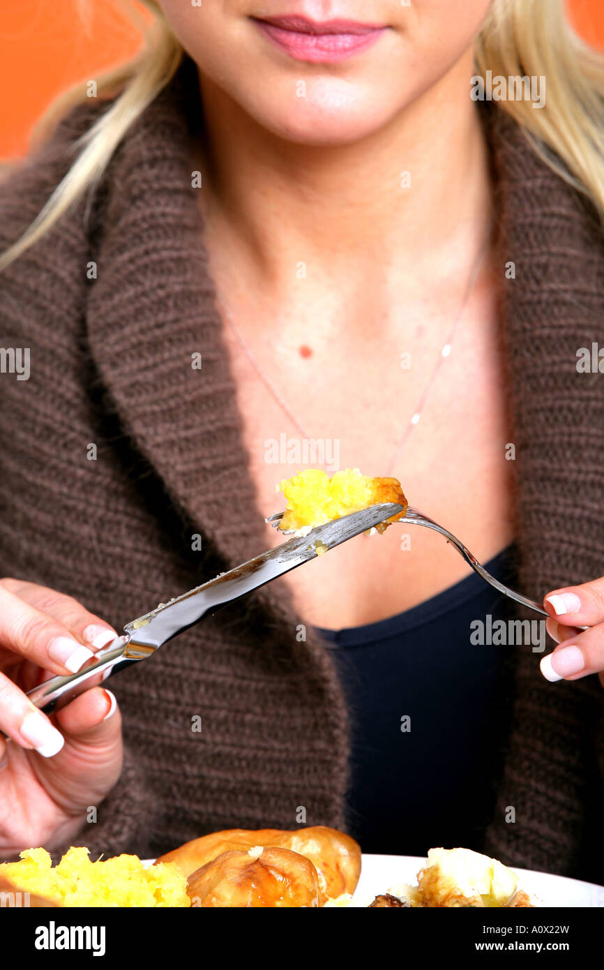 Young Woman Eating Roast Lunch Model Released Stock Photo - Alamy