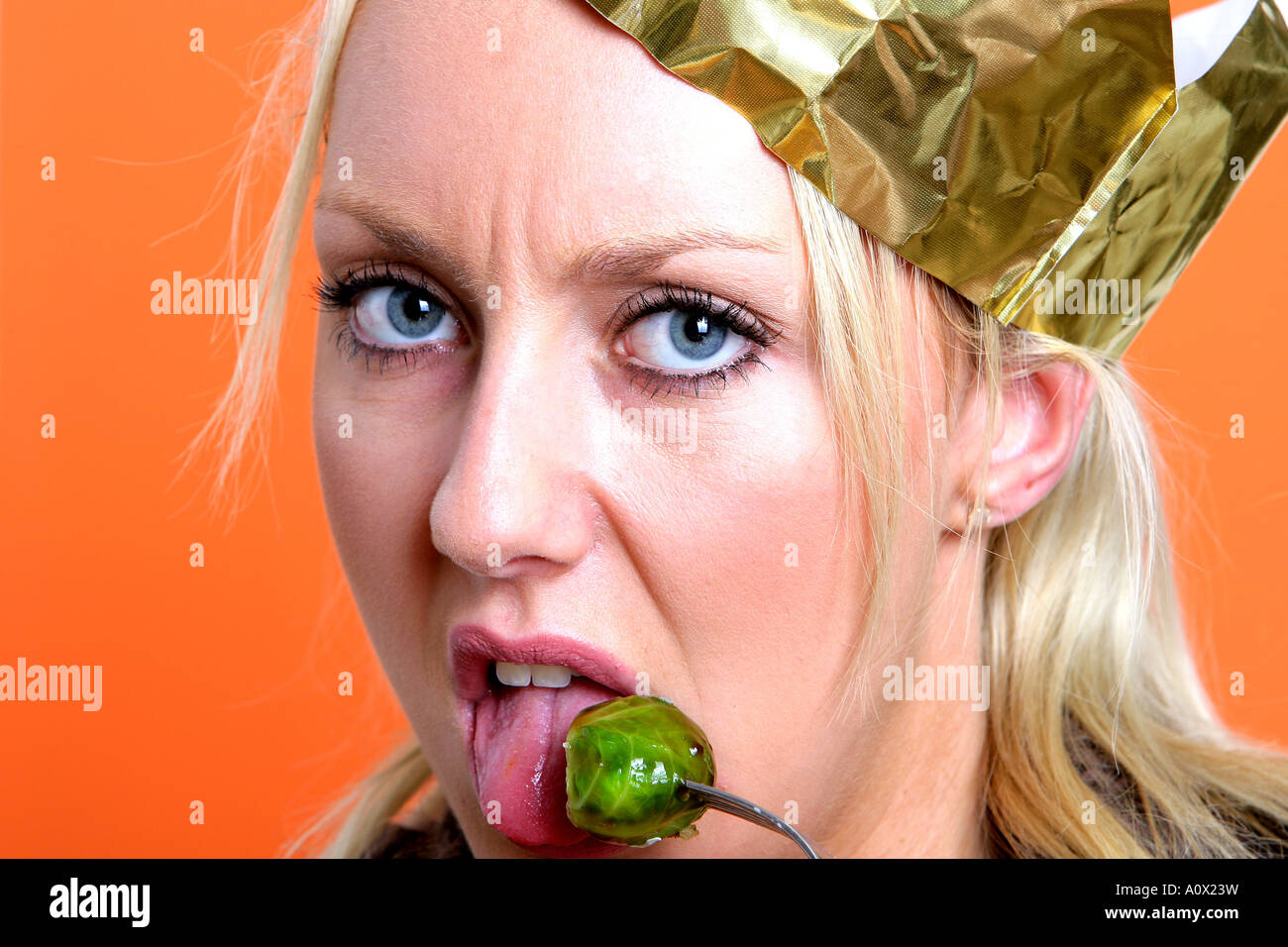 Young Woman Eating a Brussel Sprout Model Released Stock Photo - Alamy
