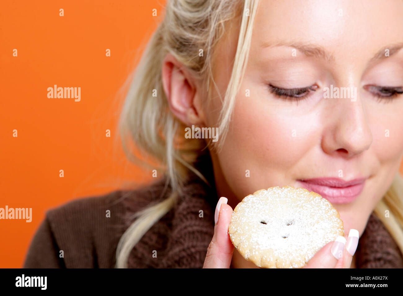 Woman Eating Mince Pies High Resolution Stock Photography and Images ...