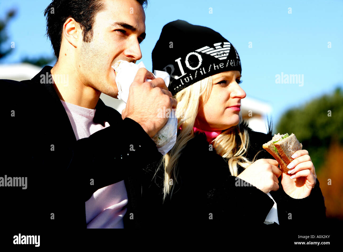 Young Couple Eating Lunch Models Released Stock Photo - Alamy
