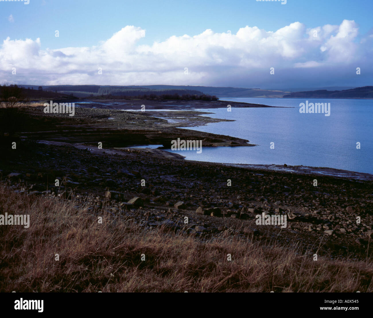 Low water level in a reservoir; water at a very low level in the summer ...