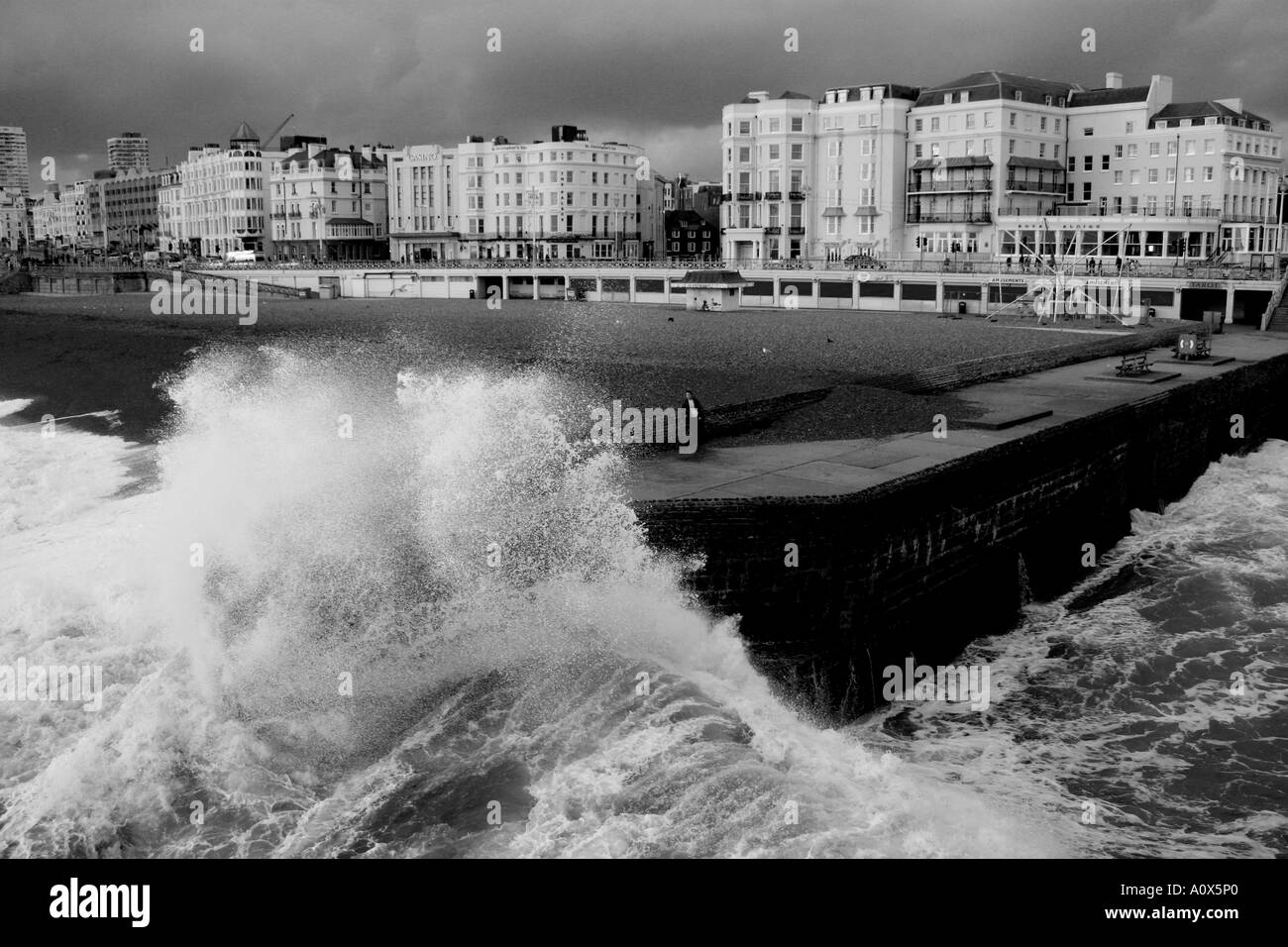 Storm Wave in Winter hitting Brighton seafront Stock Photo - Alamy