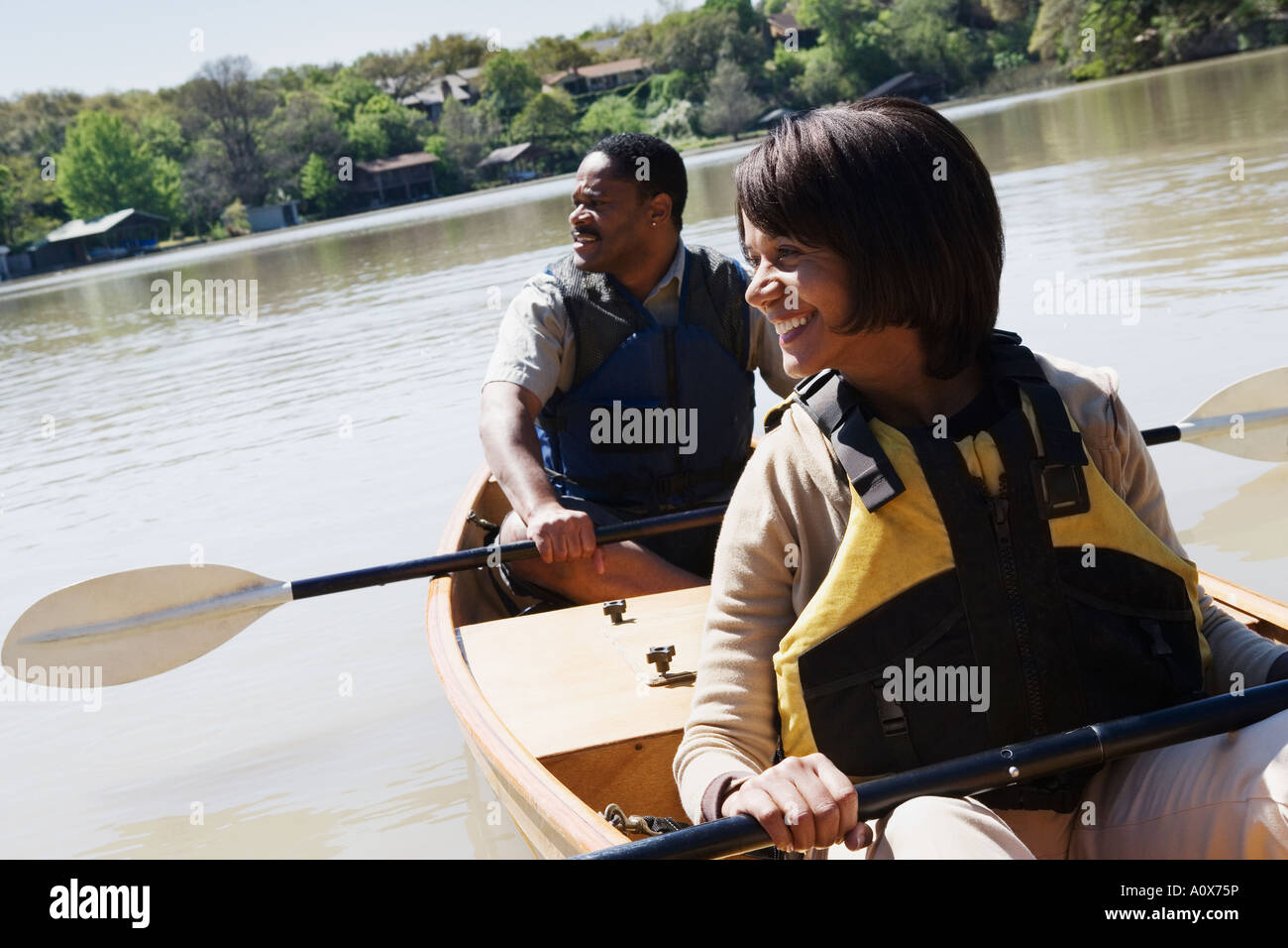 Couple in canoe Stock Photo - Alamy