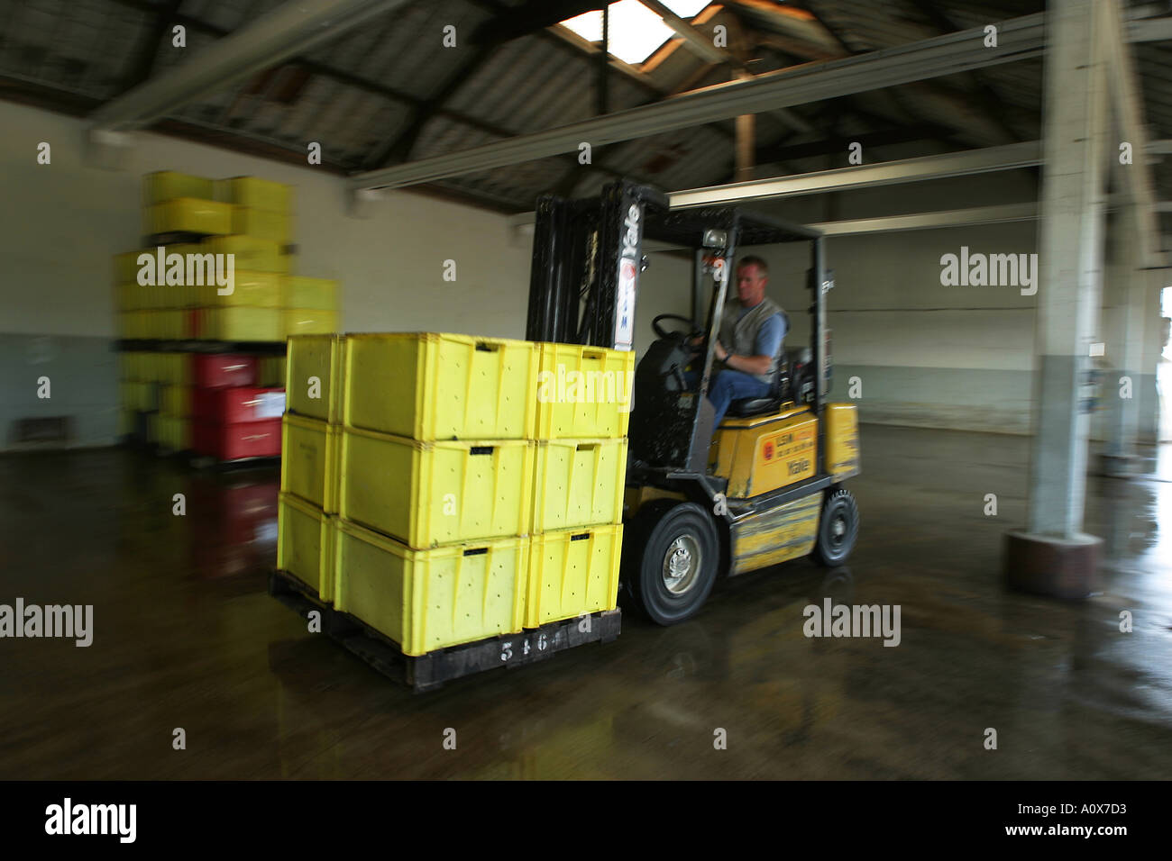 Worker carrying plastic crates hi-res stock photography and images - Alamy Worker carrying plastic crates hi-res stock photography and images - Alamy