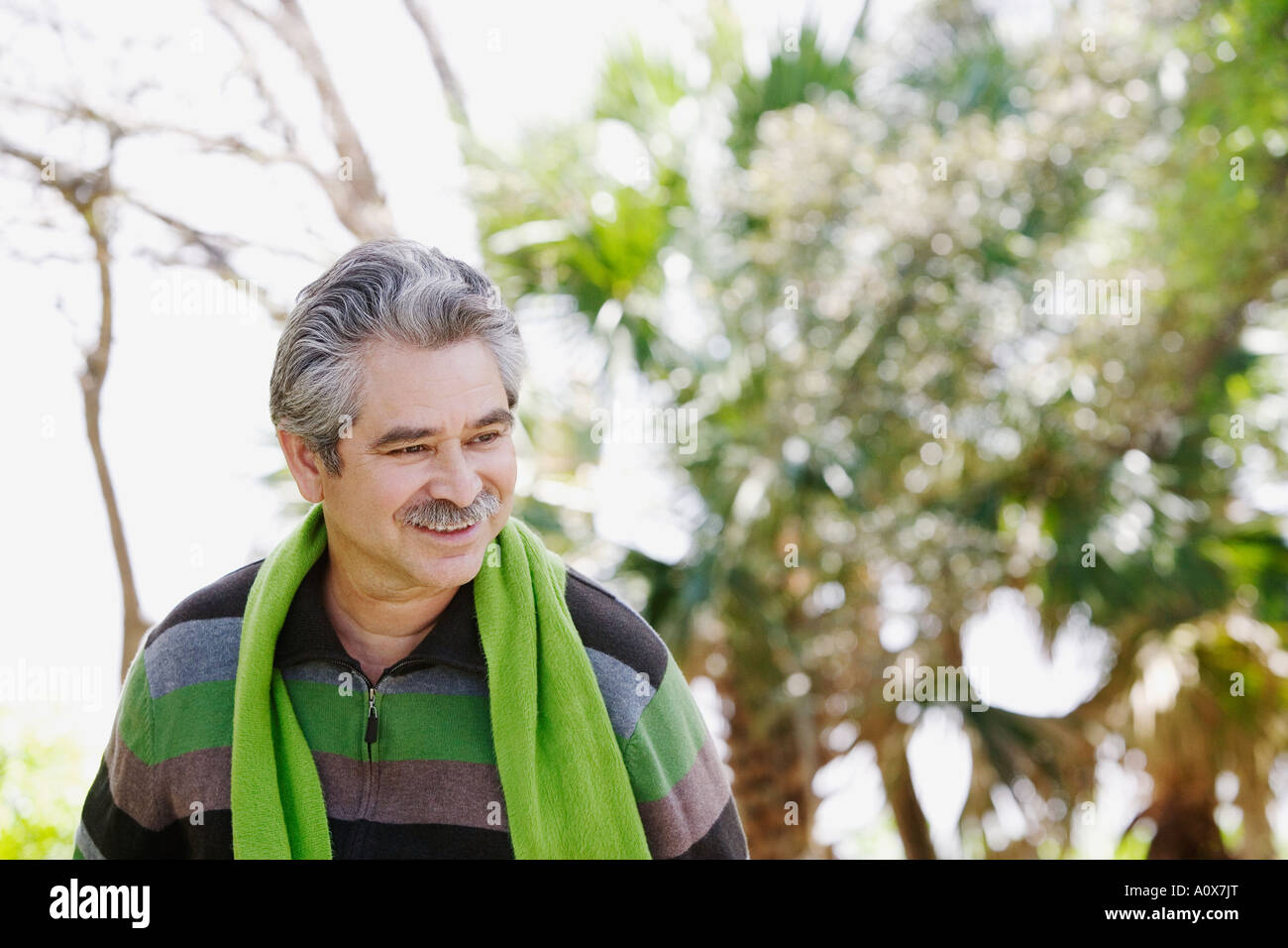 Middle aged man walking outdoors Stock Photo - Alamy