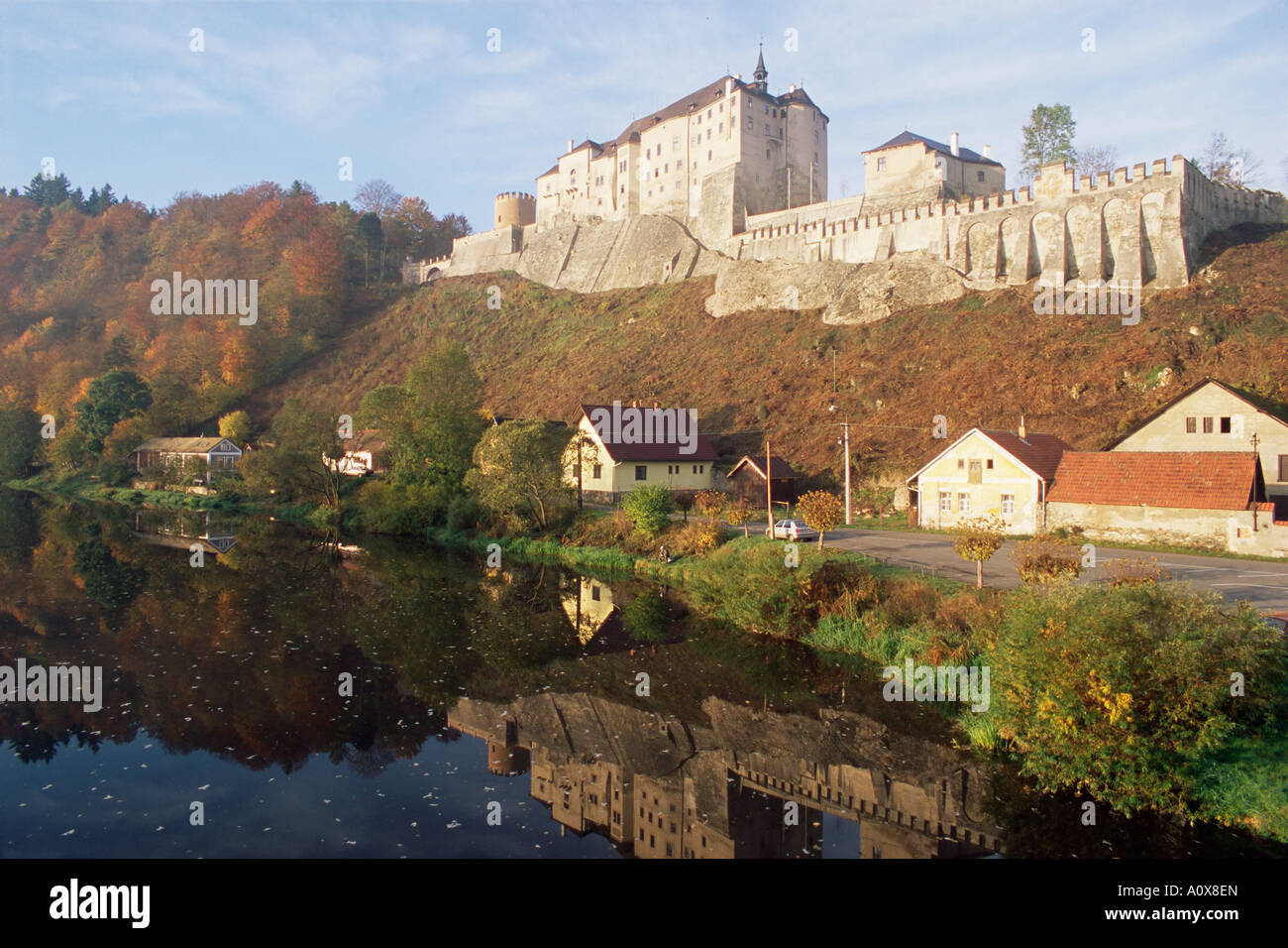 Gothic and Baroque Cesky Sternberk Castle reflected in the water of the ...