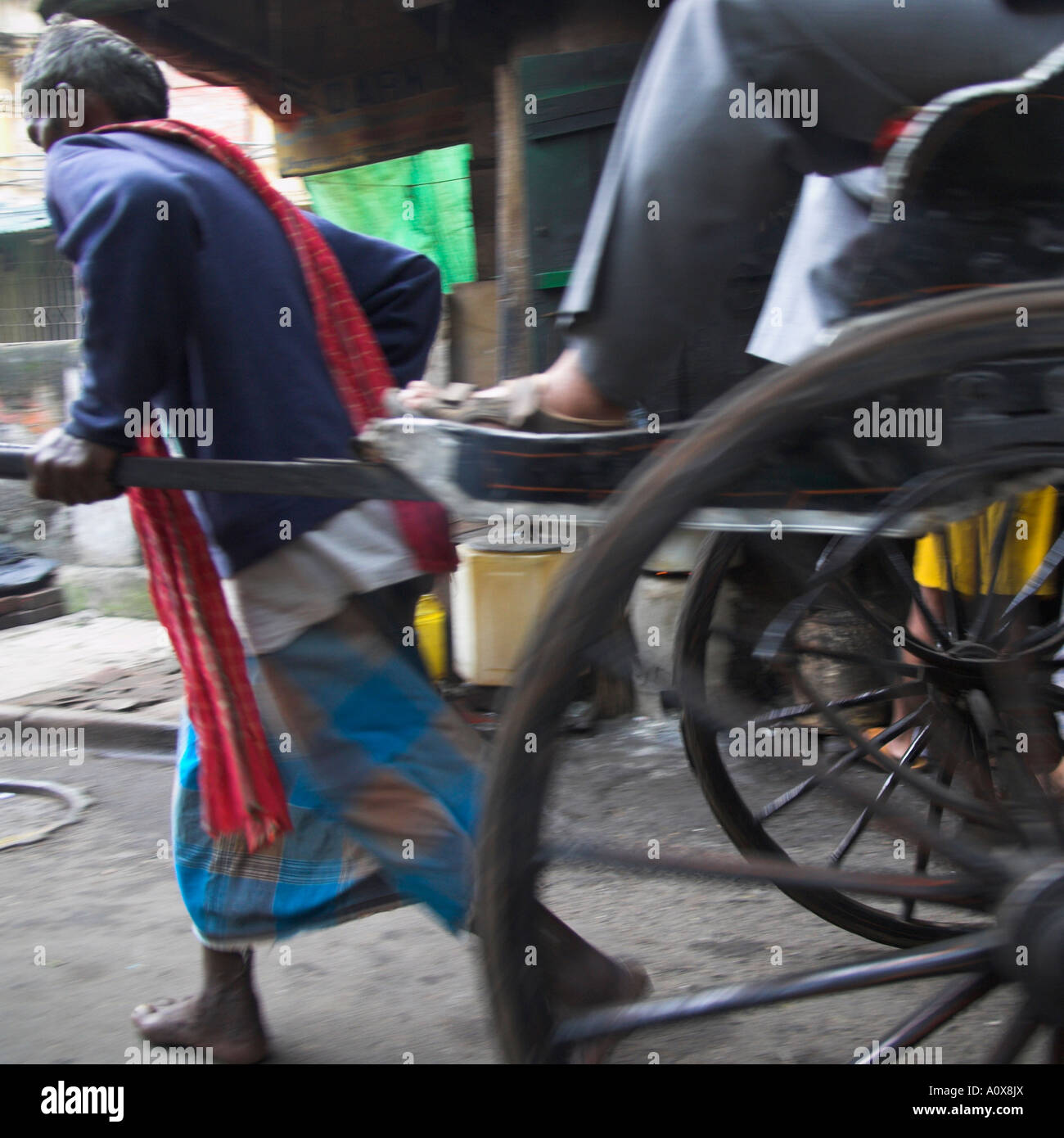 India West Bengal Kolkata New Market street scene driver pulling his ...