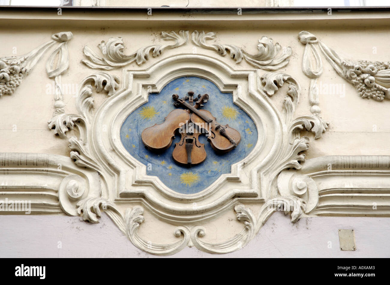 violins mural wall relief Stock Photo - Alamy