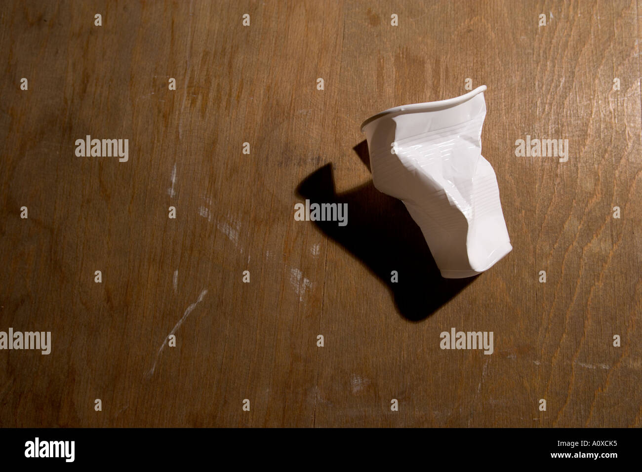 Crumpled plastic cup Stock Photo - Alamy