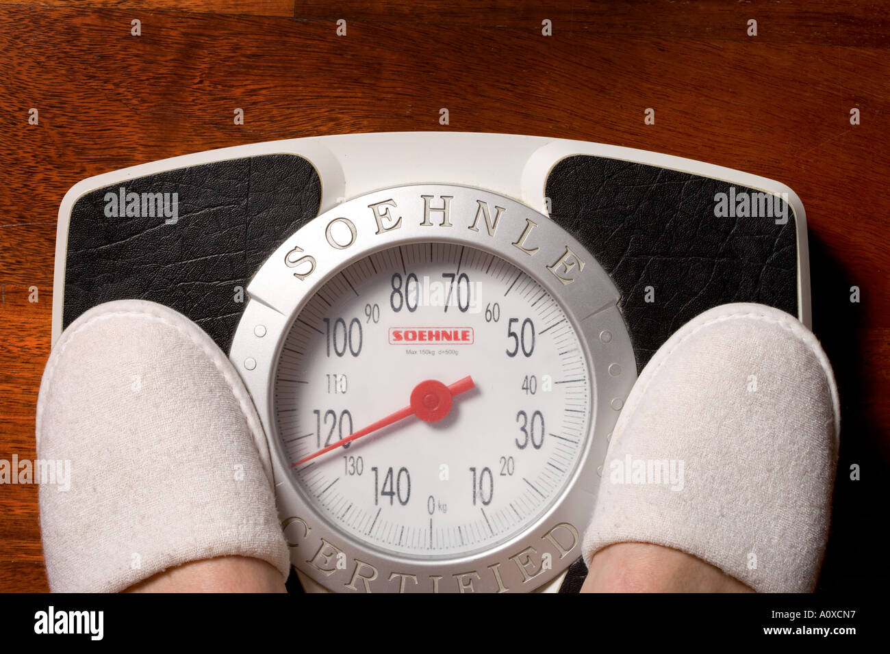 Weighing on a scale Stock Photo - Alamy