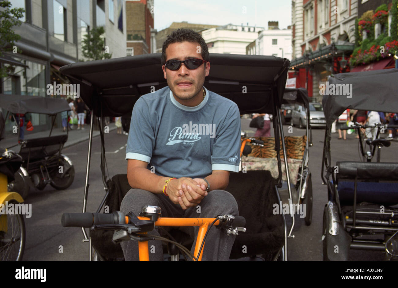 Pedicab pedicabs rickshaw rickshaws hi-res stock photography and images ...