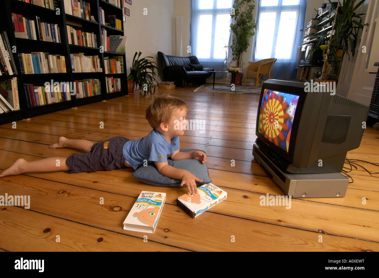 Child watching a video Stock Photo - Alamy