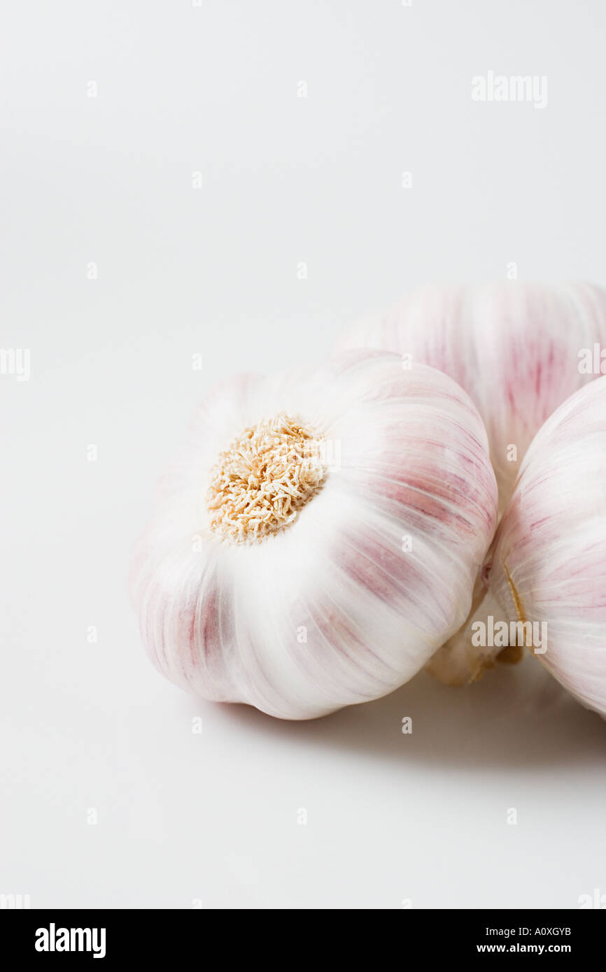 Three cloves of garlic Stock Photo - Alamy