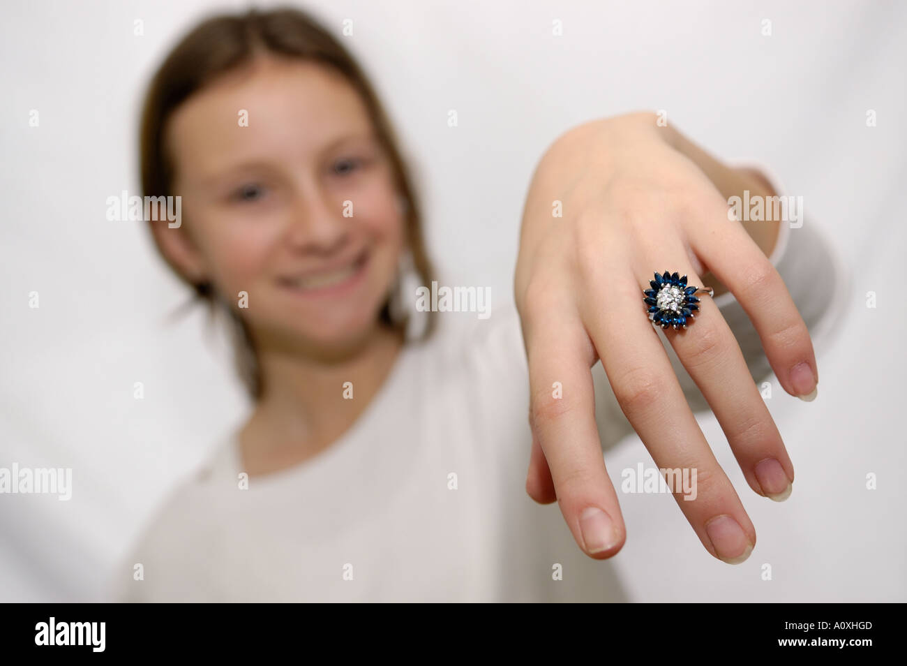 Showing off her new engagement ring hi-res stock photography and images ...