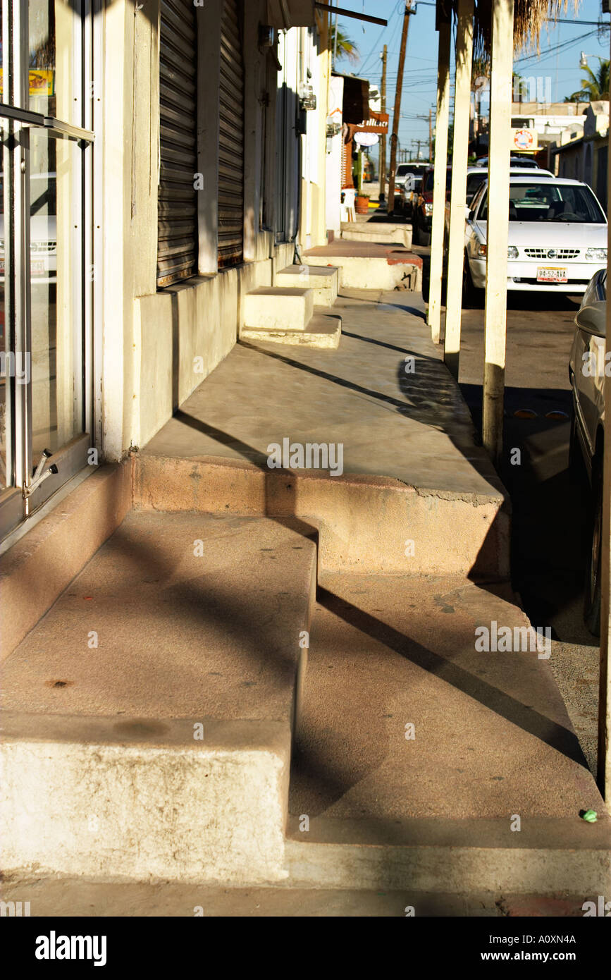 MEXICO Cabo San Lucas Sidewalk in shopping district with many steps ...
