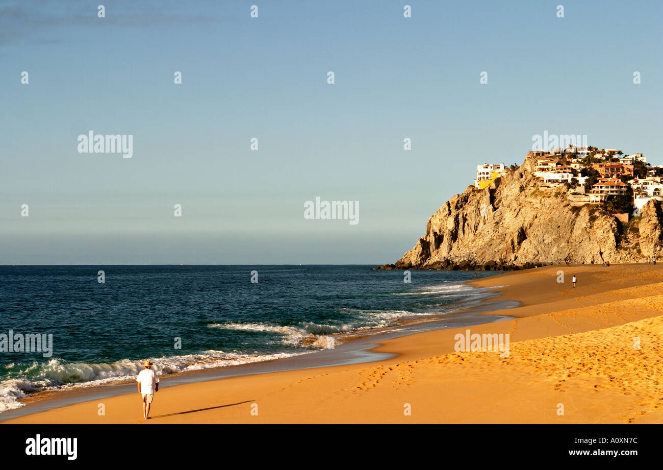MEXICO Cabo San Lucas Man walk beach along shore in morning Playa ...
