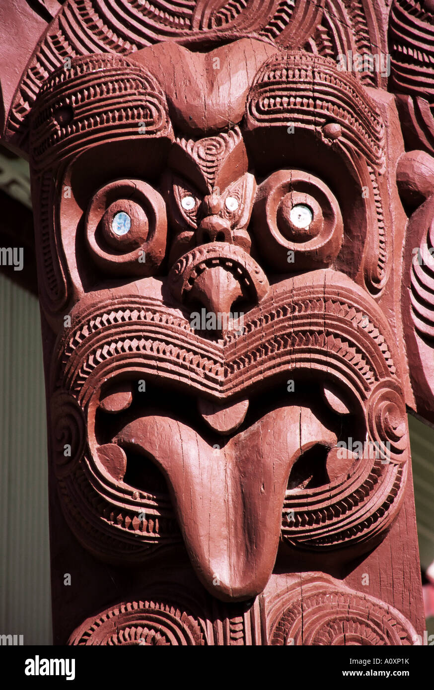 Maori wooden carving with tongue sticking out Rotorua North Island New ...