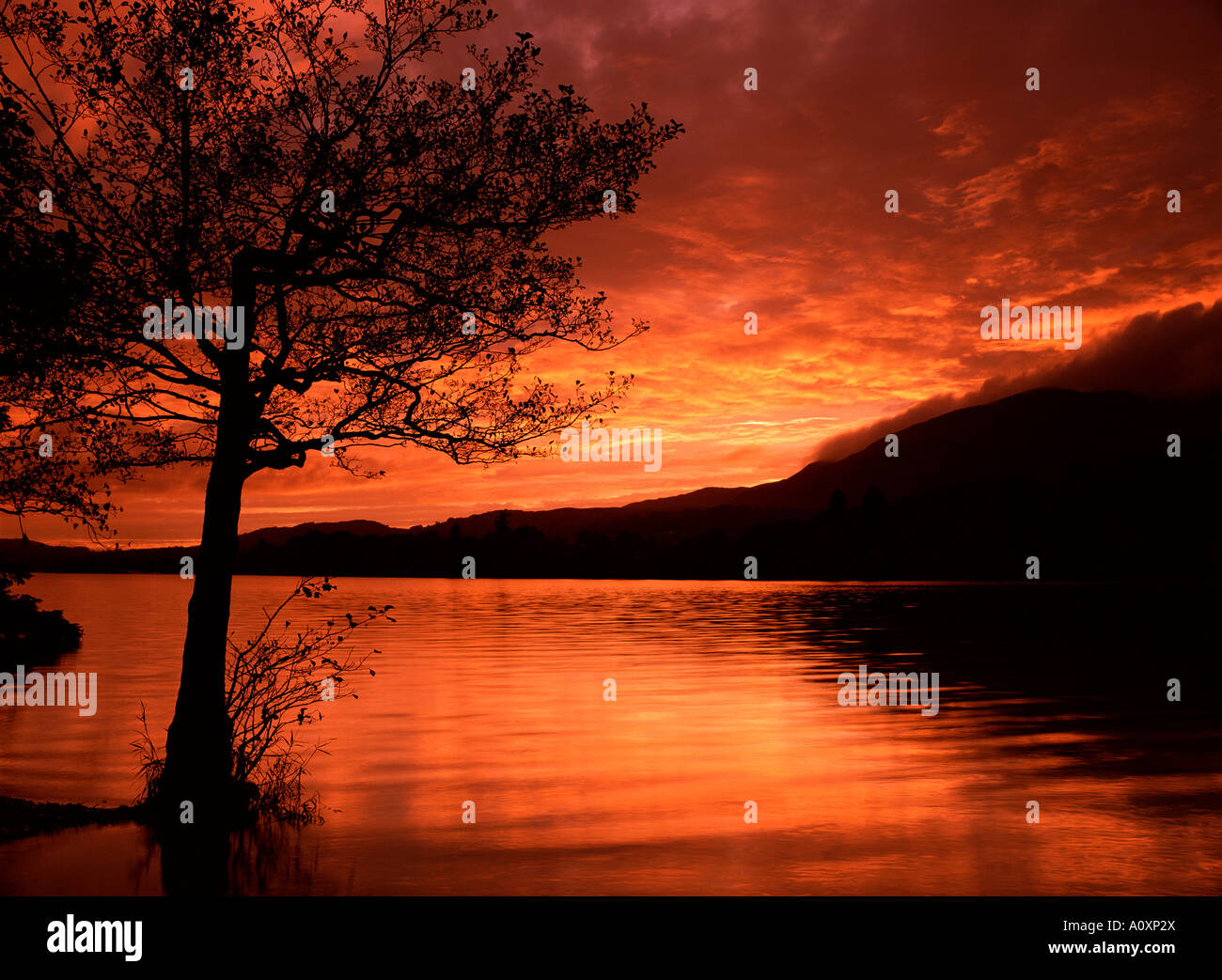 Red sky at sunset Coniston Water Consiton Lake District Cumbria England ...