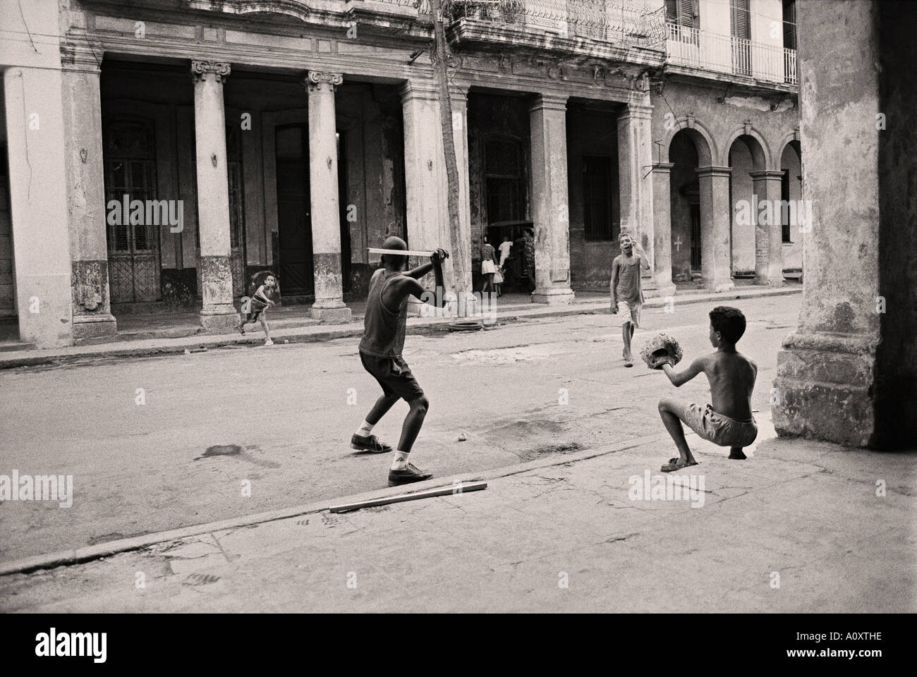 Kids Playing Baseball In The Street