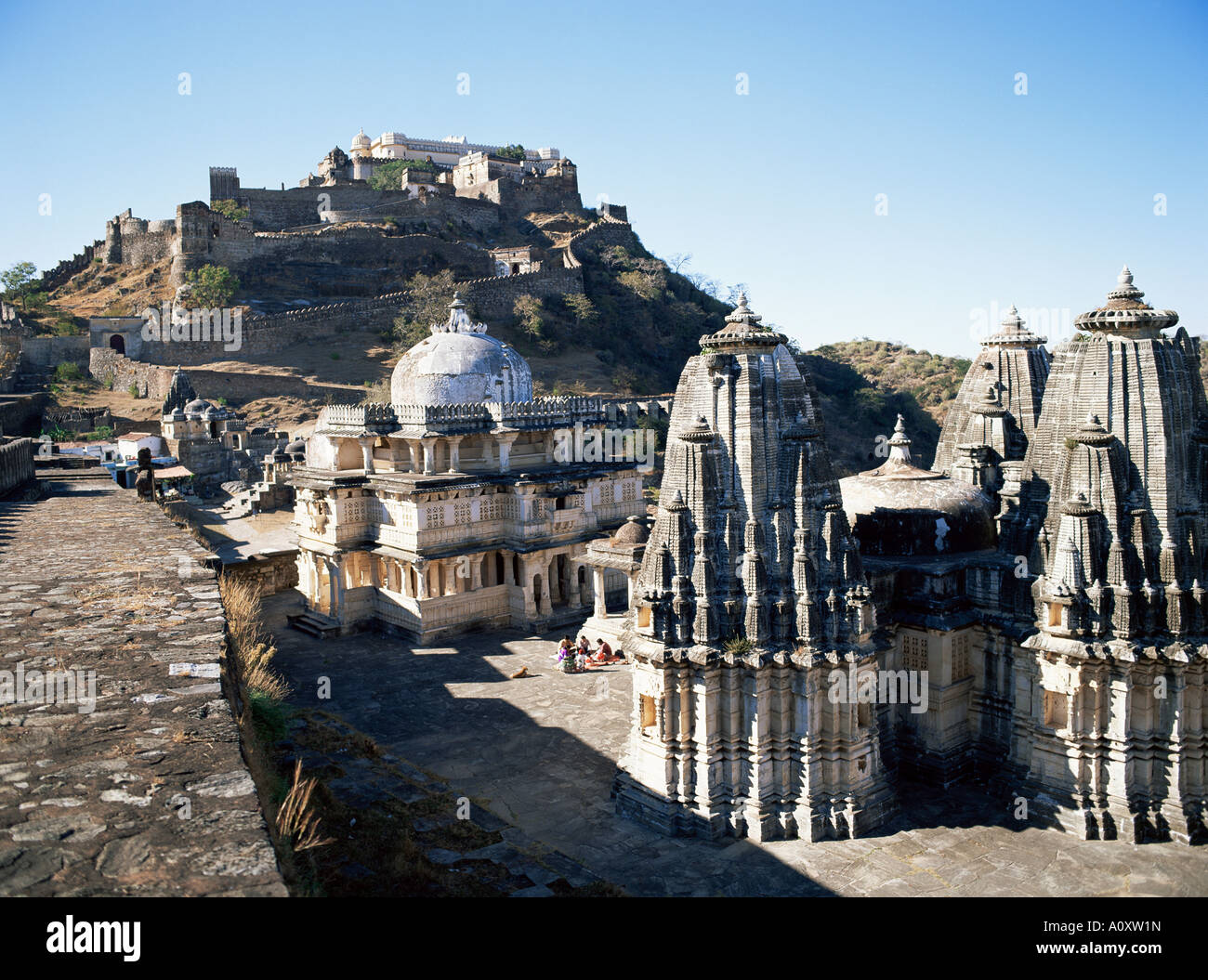 Temples in the foreground with the Badal Mahal Cloud Palace on hilltop ...
