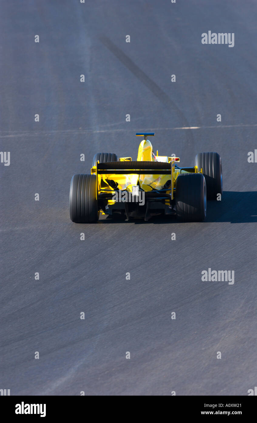yellow Formula One racecar on the track in 2005 Stock Photo - Alamy