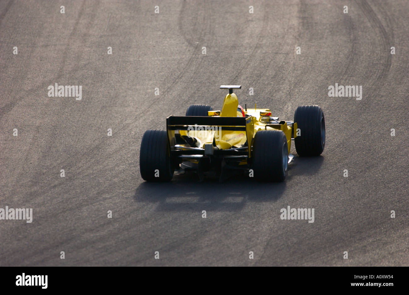 yellow Formula One racecar on the track in 2005 Stock Photo - Alamy