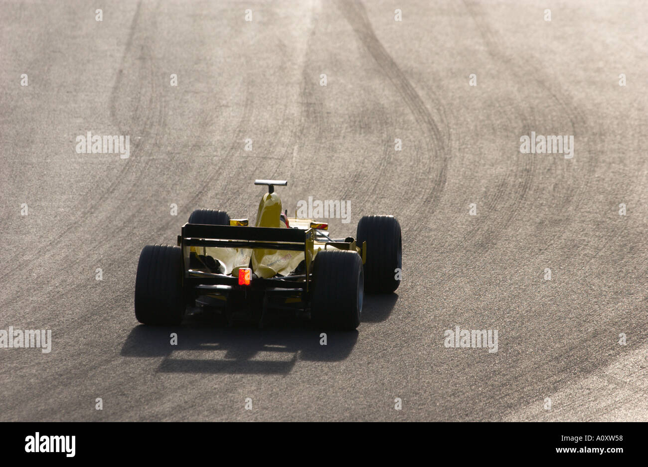 yellow Formula One racecar on the track in 2005 Stock Photo - Alamy