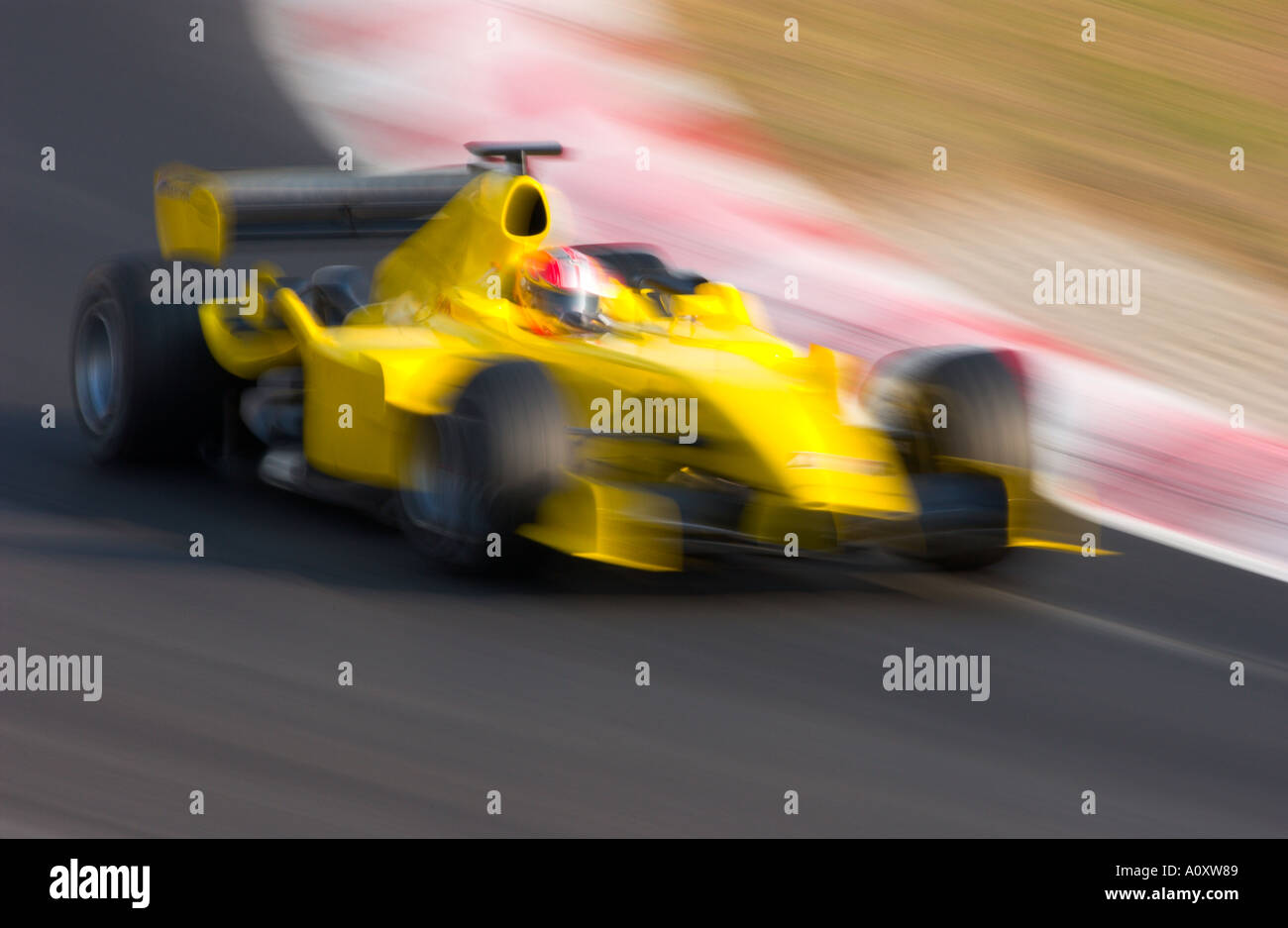 yellow Formula One racecar on the track in 2005 Stock Photo - Alamy