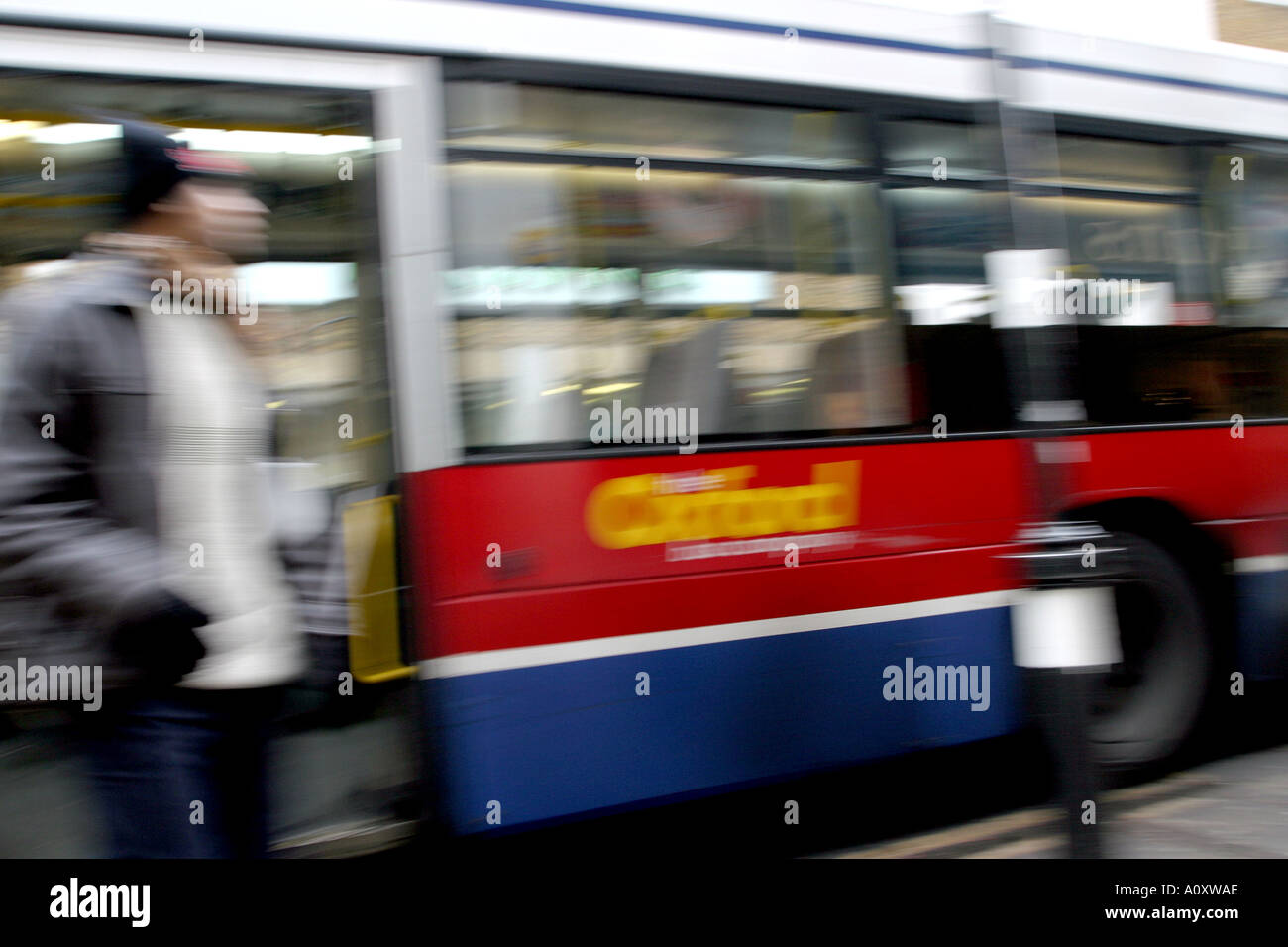 Male Person Stepping Out of the Bus Stock Photo - Alamy