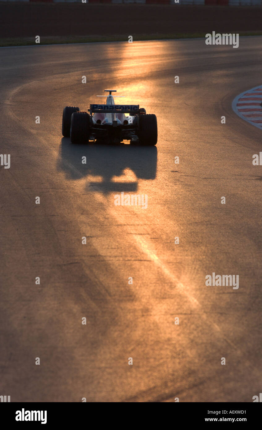 Formula 1 Race car in back light Stock Photo - Alamy