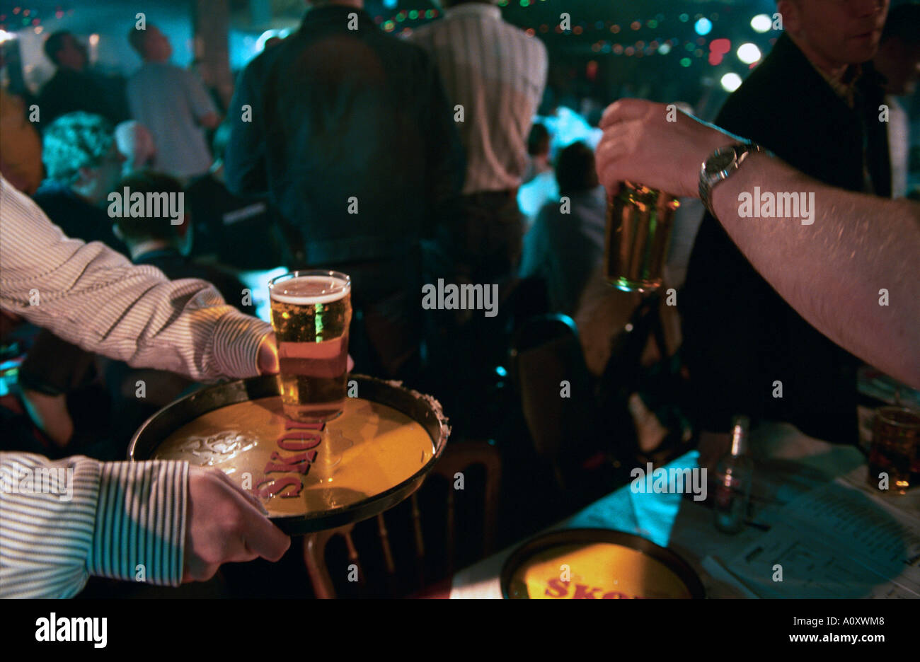 Man holding pints hi-res stock photography and images - Alamy
