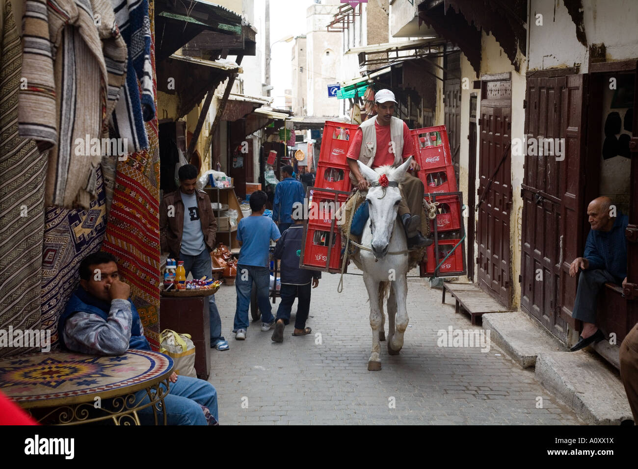 Street scene in the medina old town Fes el Bali Fes Morocco Stock Photo ...
