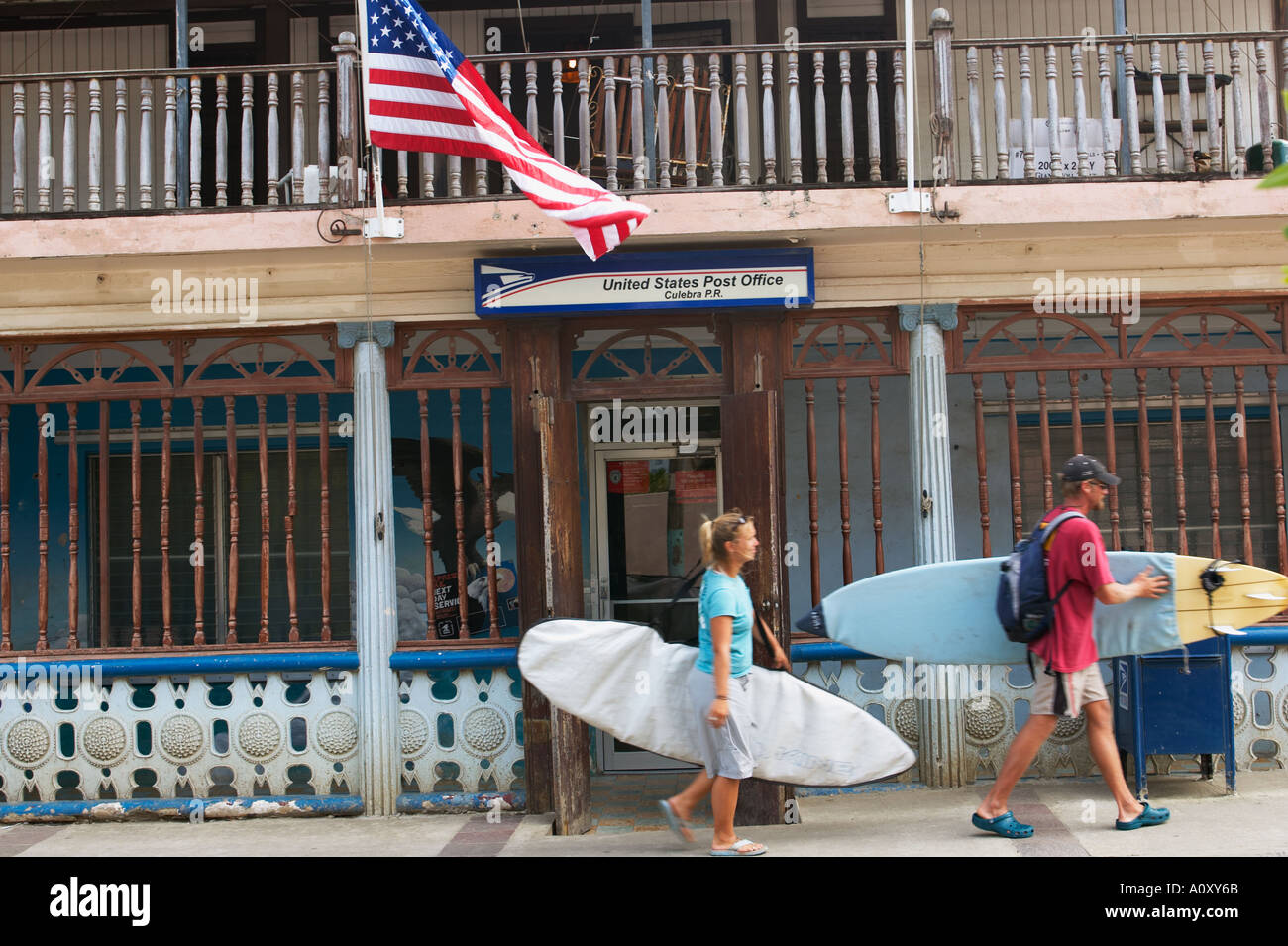 PUERTO RICO Culebra USPS post office man and woman carry surfboards ...