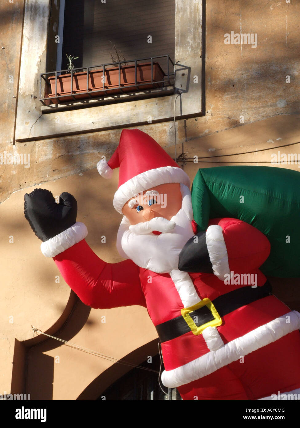 inflatable father christmas in rome Stock Photo - Alamy