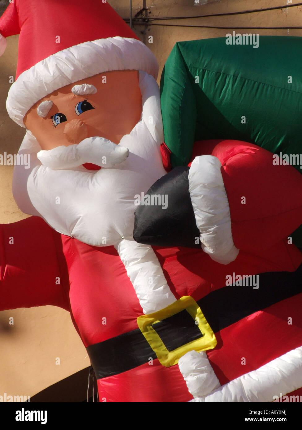 inflatable father christmas in rome Stock Photo - Alamy