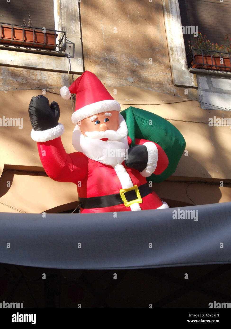 inflatable father christmas in rome Stock Photo - Alamy