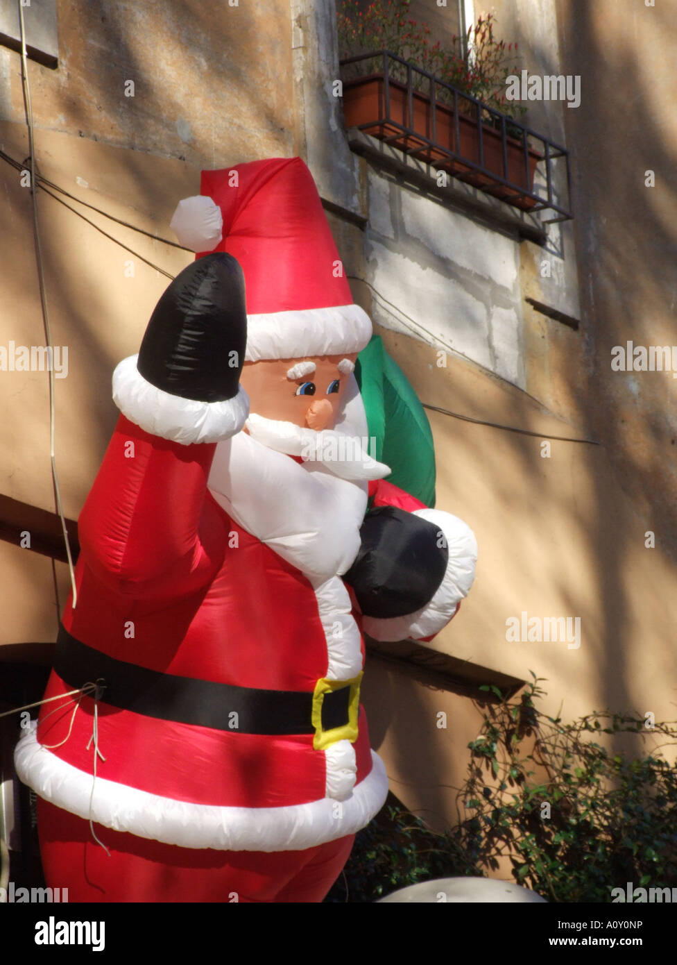 inflatable father christmas in rome Stock Photo - Alamy