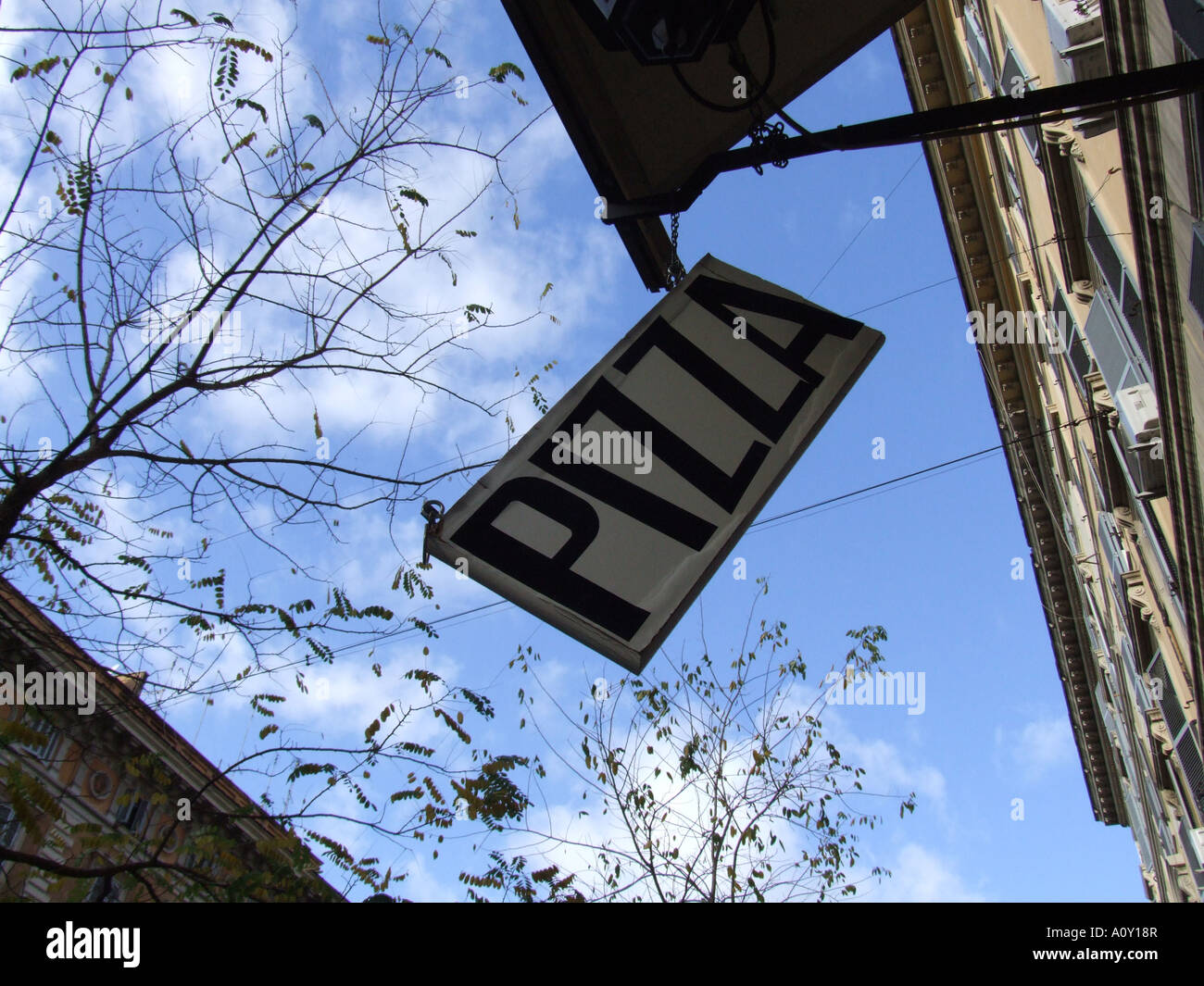 a pizza sign hanging outside shop Stock Photo - Alamy