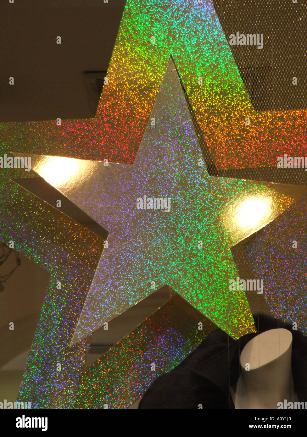 gold stars in shop window display Stock Photo - Alamy