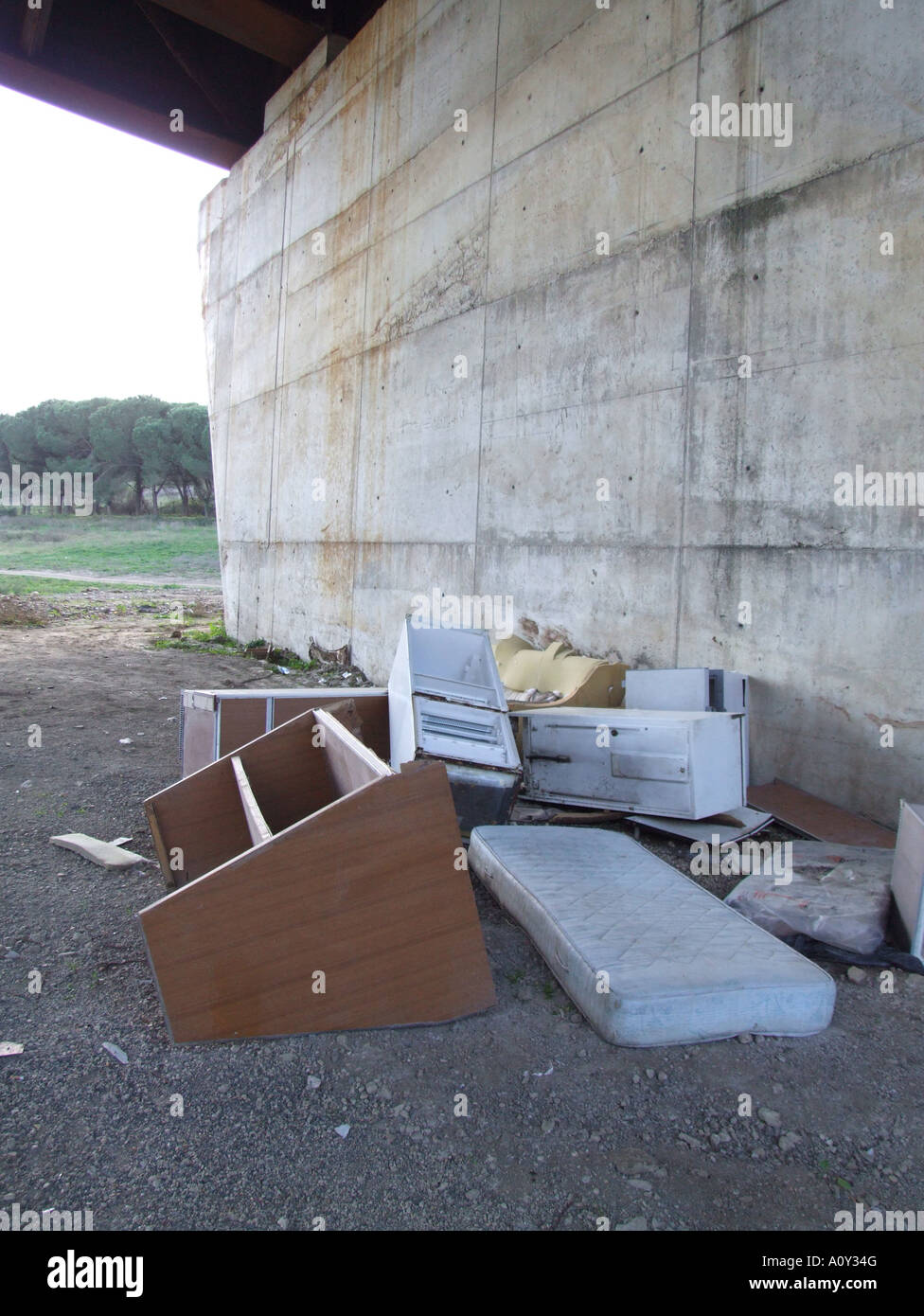 old household items dumped on derelict ground Stock Photo - Alamy