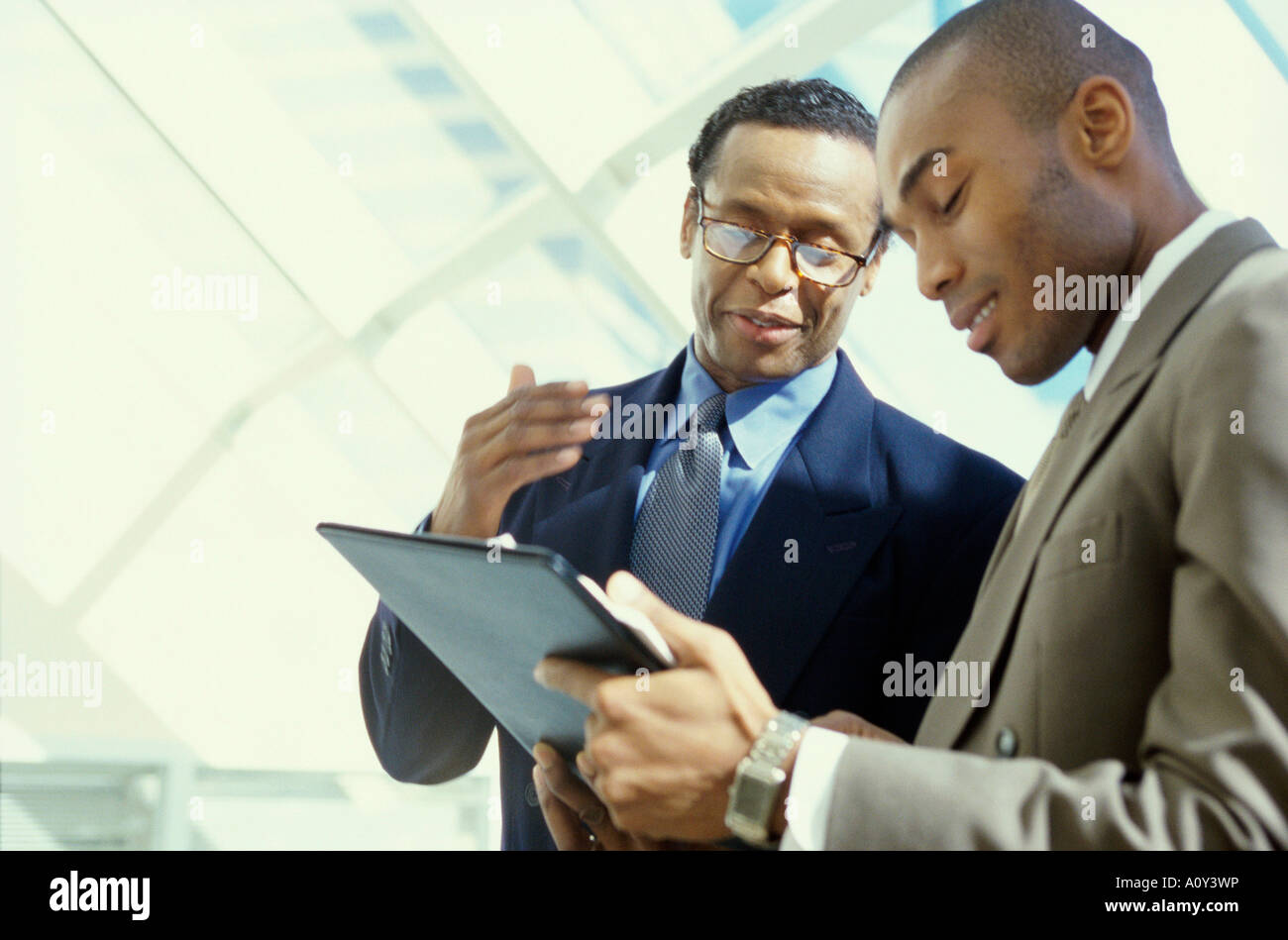 Low angle talking men hi-res stock photography and images - Alamy