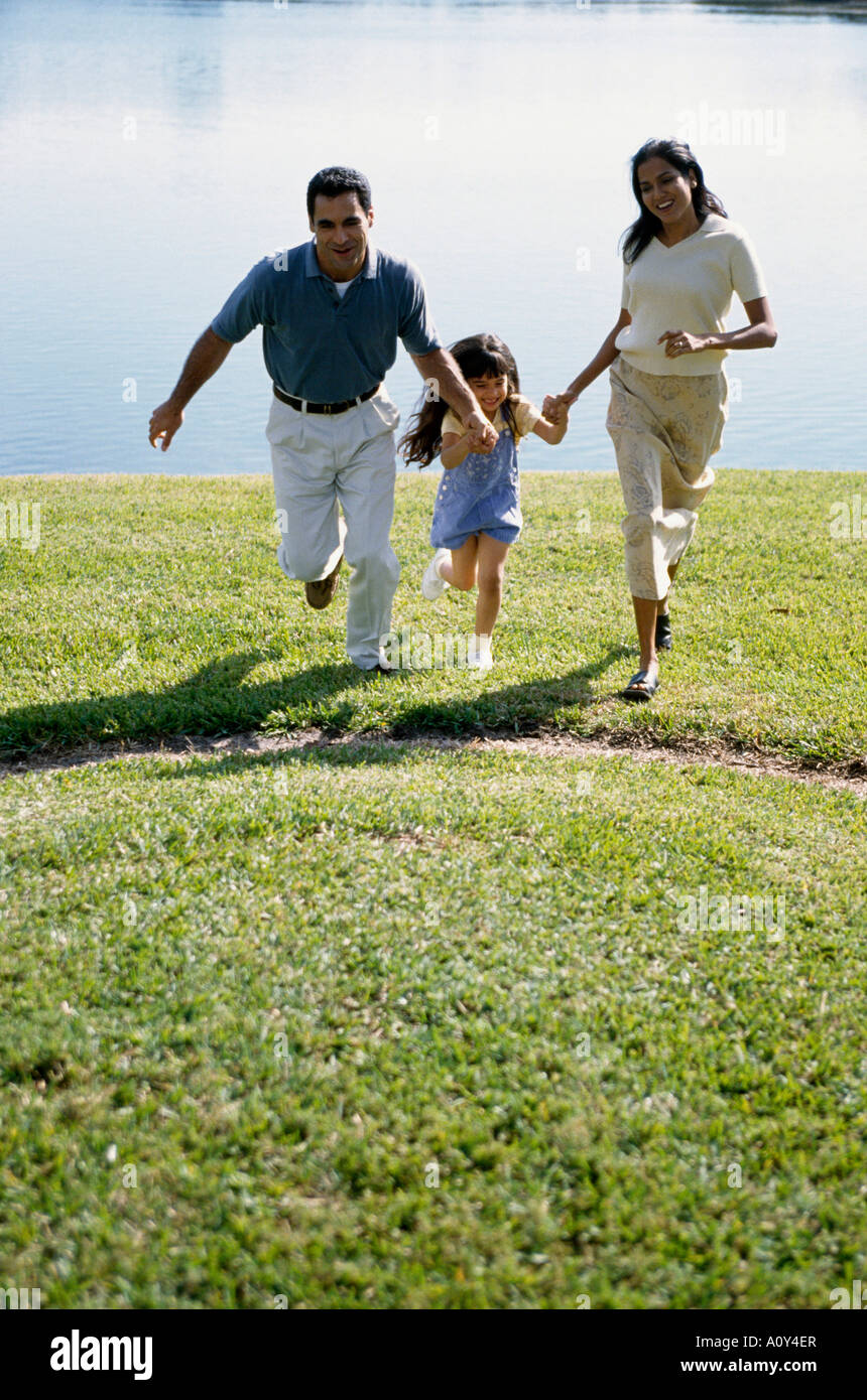Parents holding childrens hands hi-res stock photography and images - Alamy