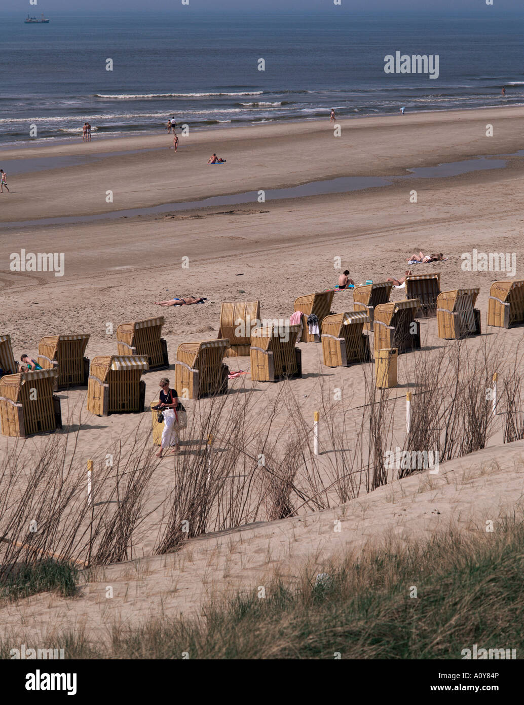 Cane chairs on beach Egmond Holland Europe Stock Photo - Alamy