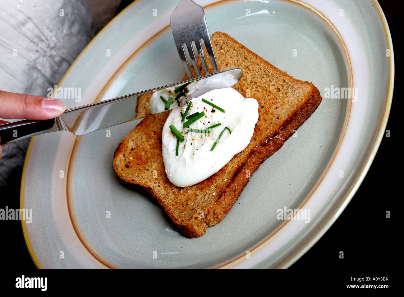 Poached Egg on Toast Stock Photo - Alamy