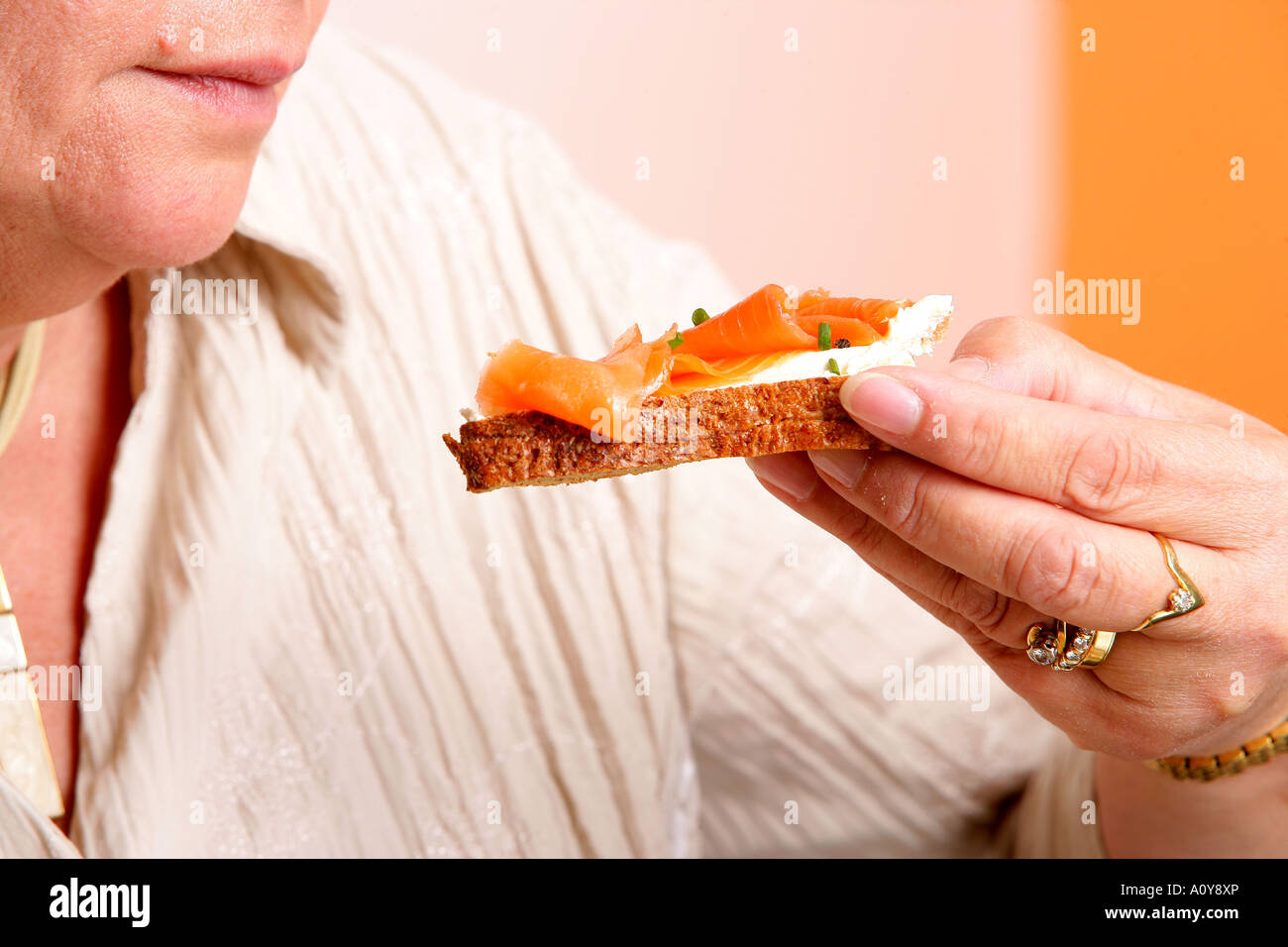 Mature Woman Eating Lunch Model Released Stock Photo - Alamy