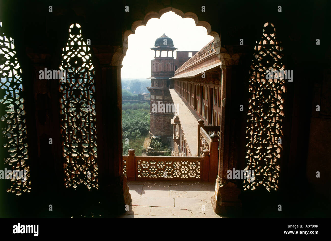 Framed by an archway which is flanked by filigree screens the balcony ...